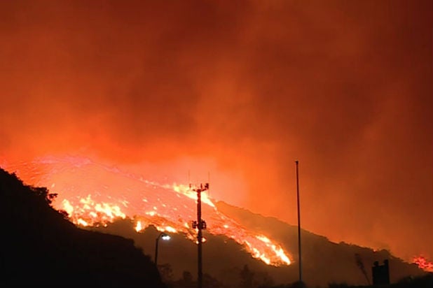 Getty Wildfire Along 405 Freeway Sparks Mass Evacuations, Threatens ...