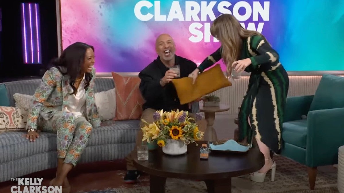 Kelly Clarkson Tries to Dry Jo Koy With Pillow After He Spills Plant on Himself